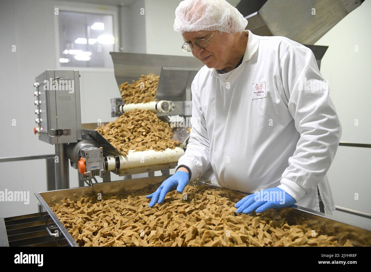 A worker is seen at the Proform Foods manufacturing facility in Sydney ...