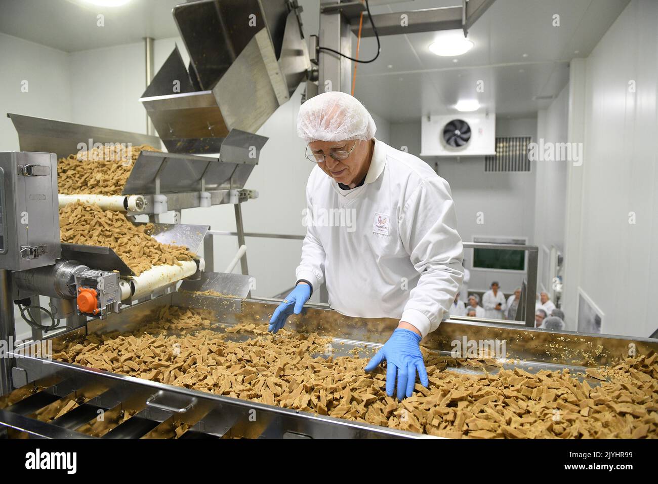 A worker is seen at the Proform Foods manufacturing facility in Sydney ...