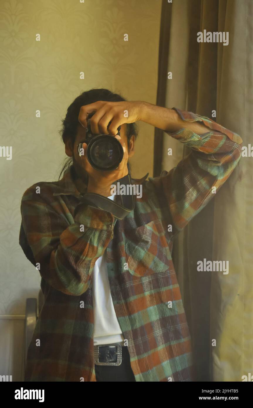 Good looking asian guy take hi-res stock photography and images - Alamy