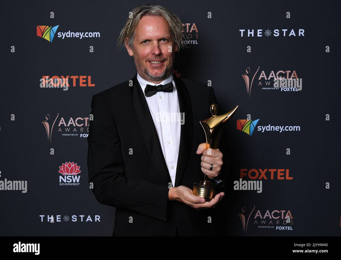 Jamie Hilton poses with the award for Best Indie Film at the 2020 AACTA ...