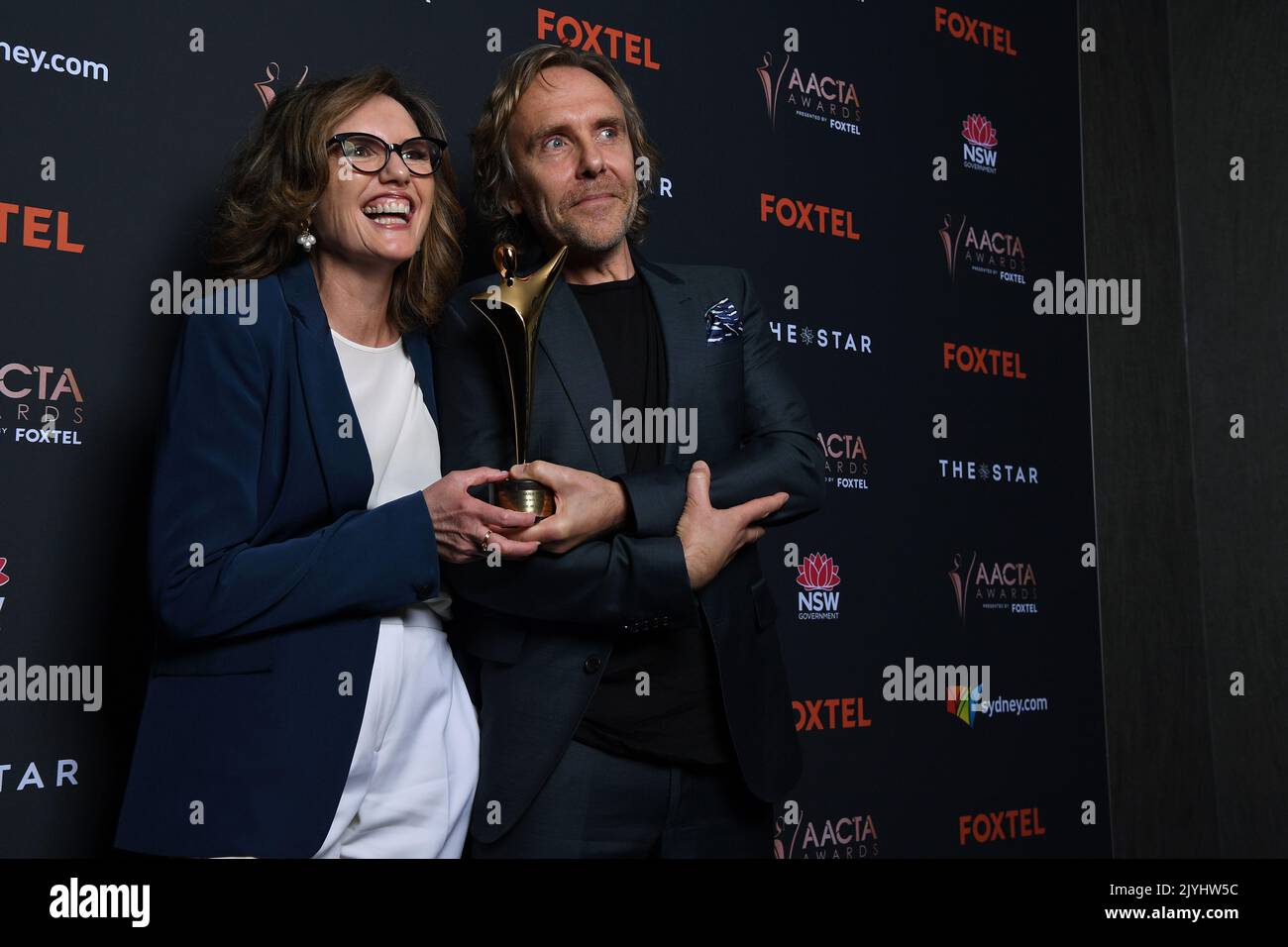 Robyn Butler and Wayne Hope pose with the award for Best Online Drama ...
