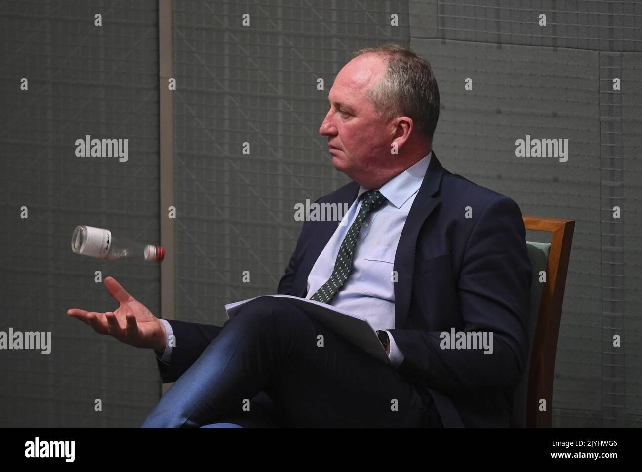 Nationals MP Barnaby Joyce flips a water bottle during House of ...