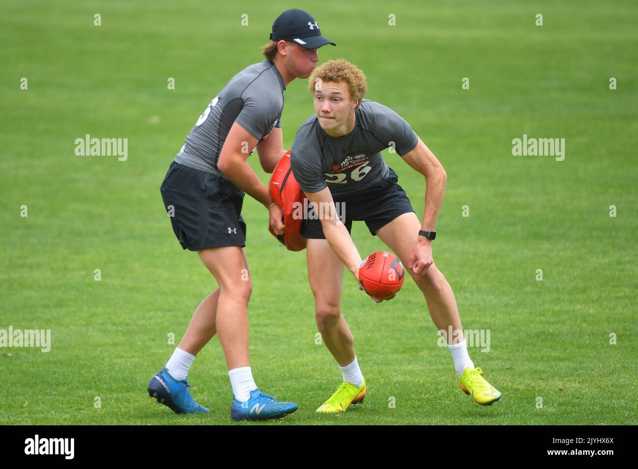Ryan Angwin (right) of the Gippsland Power in action during a training ...