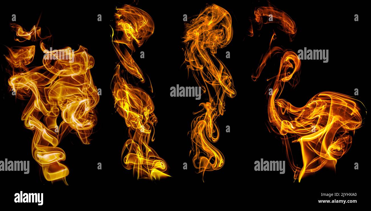 A set of isolated samples of orange smoke on a black background Stock ...