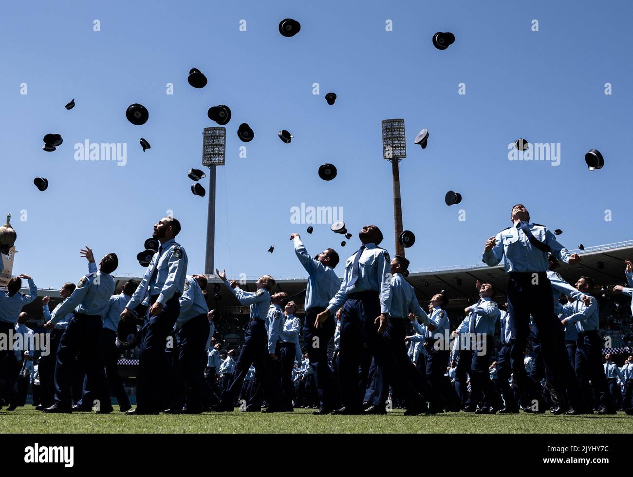 Police Officers throwing their hats into the air after the Classes of ...