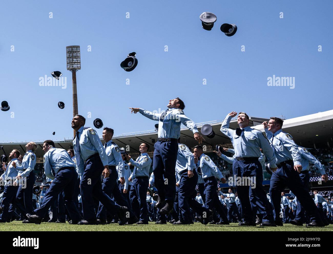 Police Officers throwing their hats into the air after the Classes of ...