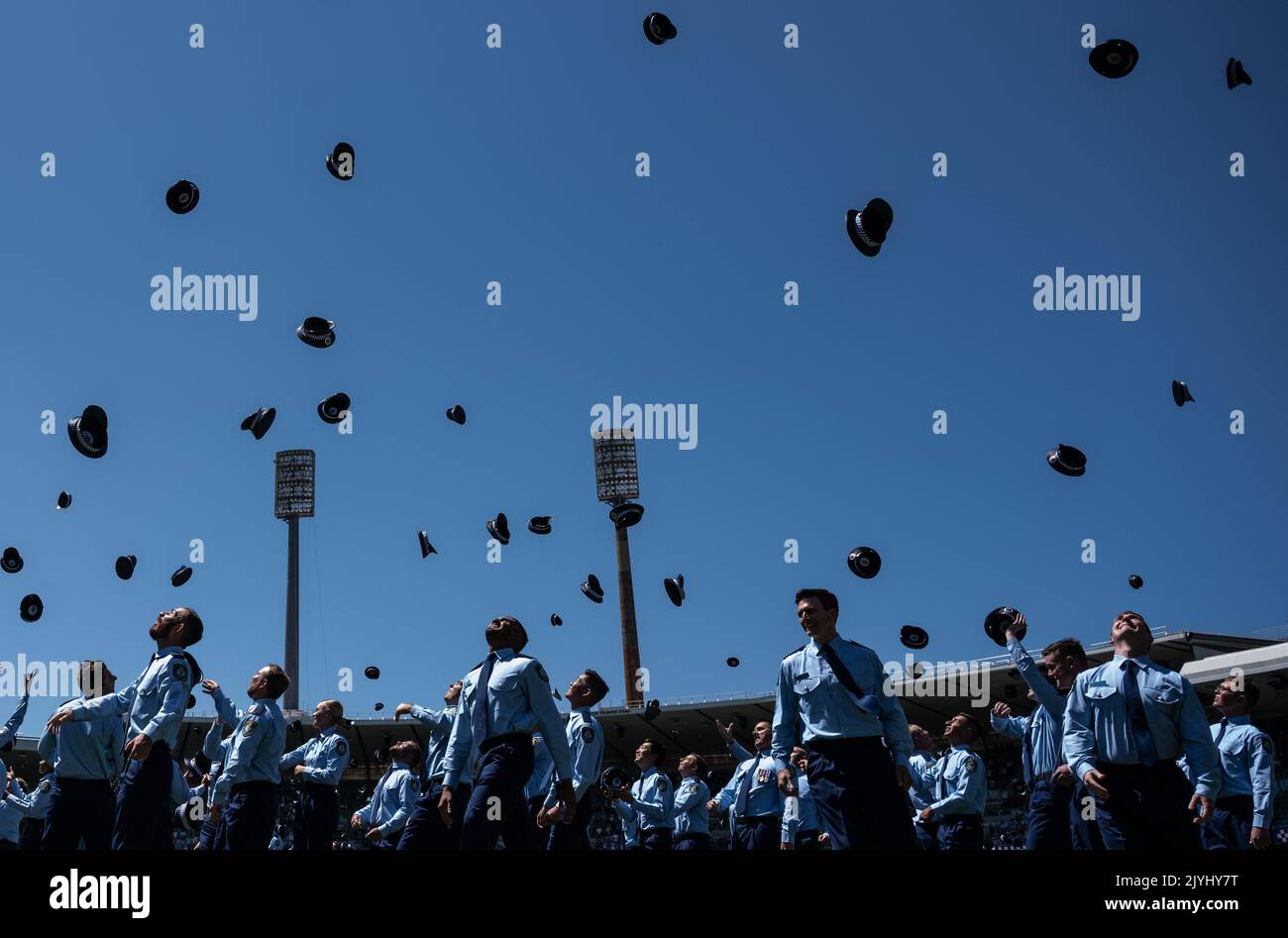 Police Officers throwing their hats into the air after the Classes of ...