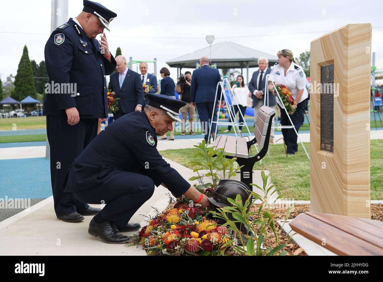 FS Commissioner Rob Rogers lays a wreath at the memorial stone during ...