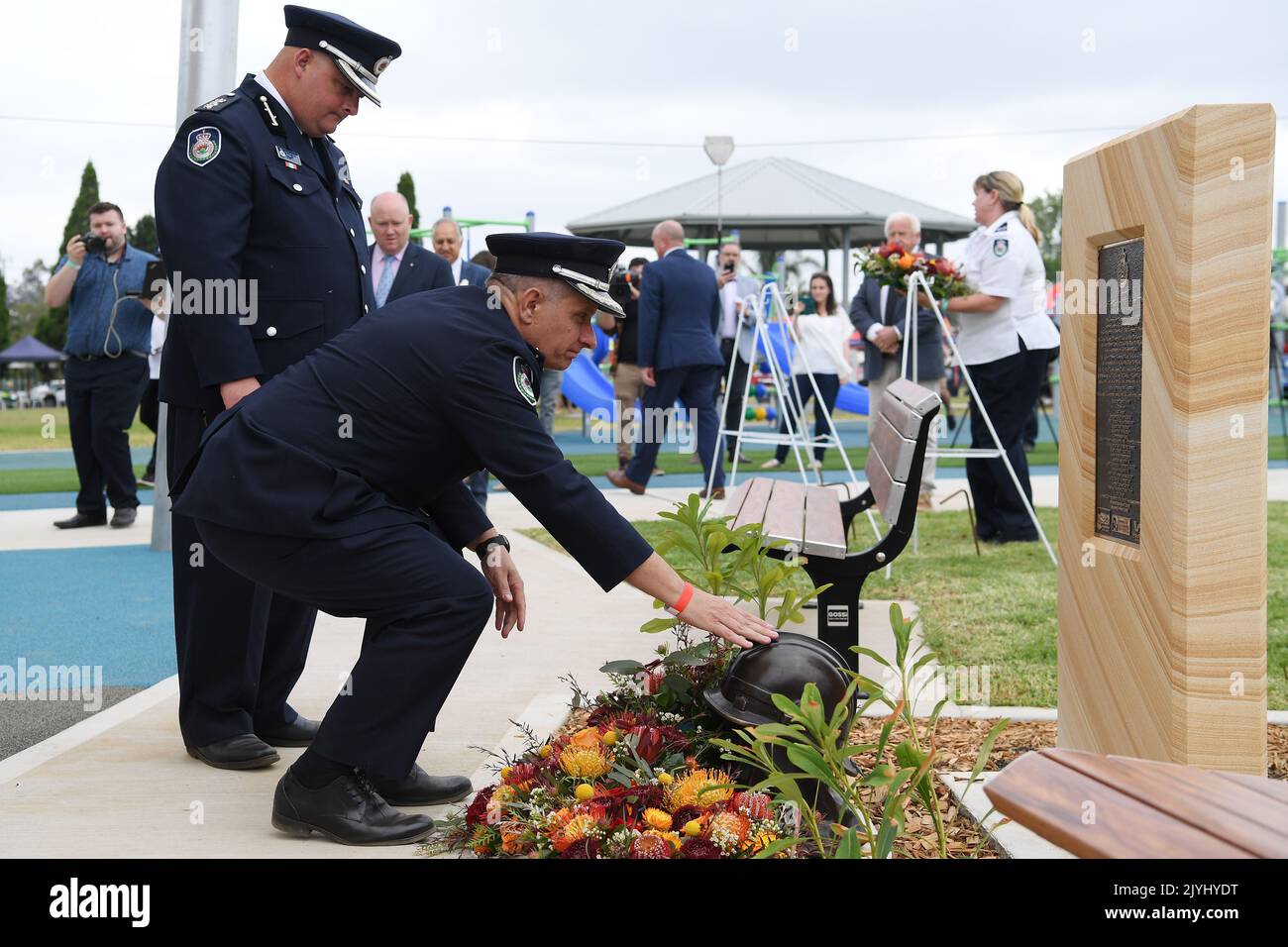 FS Commissioner Rob Rogers lays a wreath at the memorial stone during ...