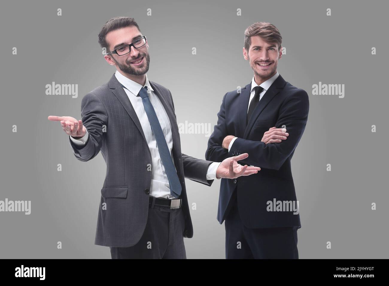 in full growth. two businessmen standing together Stock Photo - Alamy