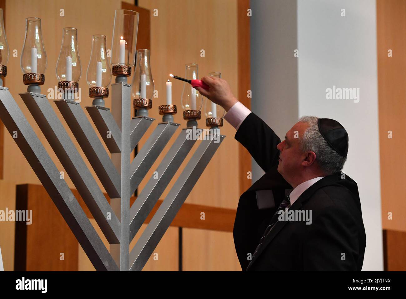 Centre Alliance Senator Sterling Griff lights the menorah at a Hanukkah ...