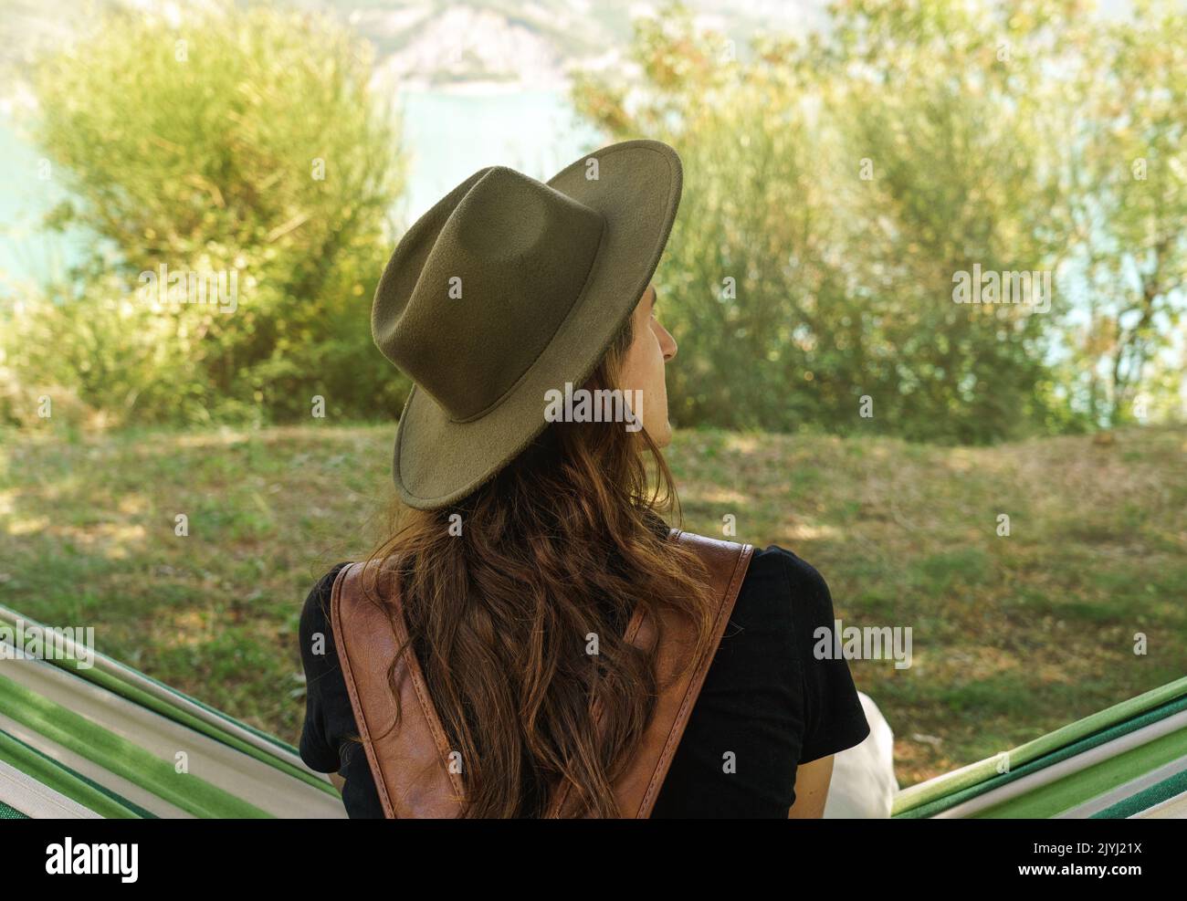 Man resting on hammock Stock Photo - Alamy