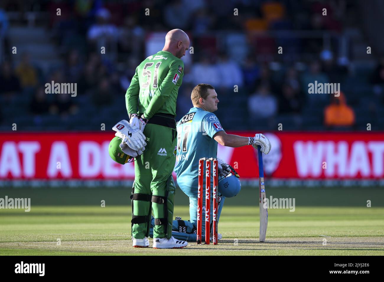 Ben Dunk of the Stars and Max Bryant of the Heat kneel ahead of the Big ...