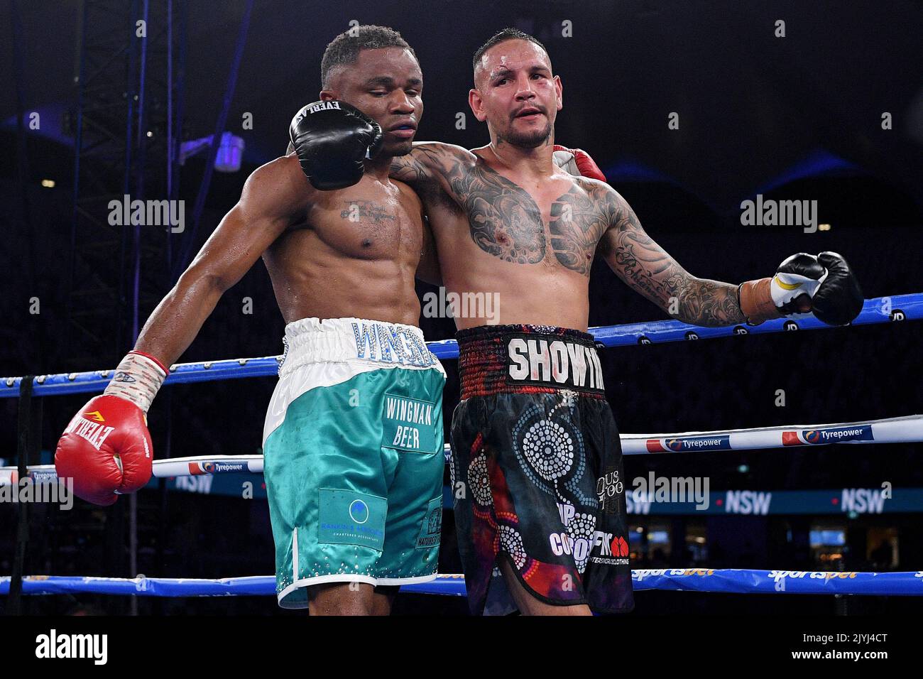 Bruno Tarimo and Paul Fleming embrace after their technical draw in ...