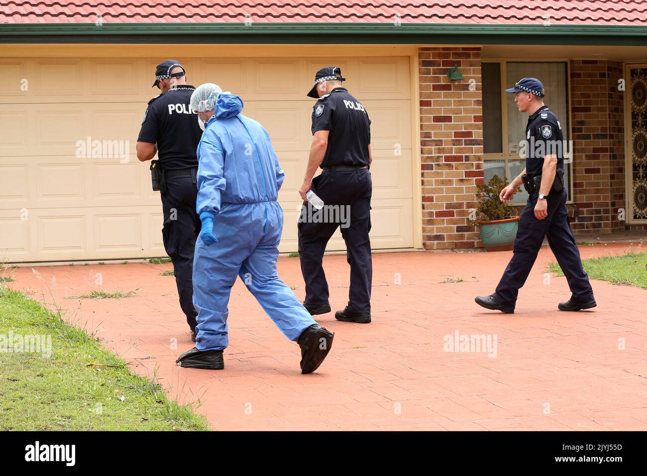 Queensland police and forensics at a house that is the scene of double ...