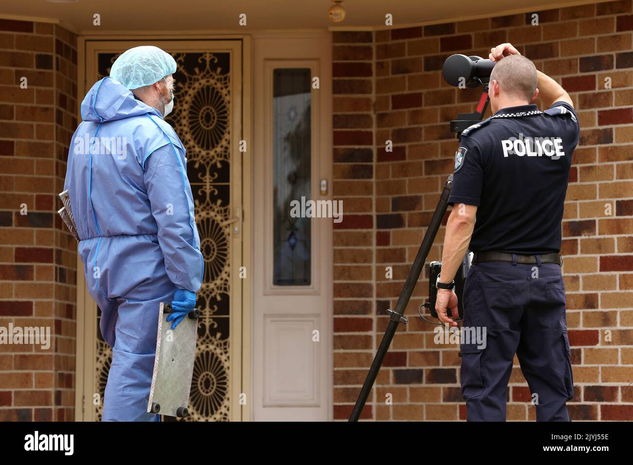 Queensland police and forensics at a house that is the scene of double ...