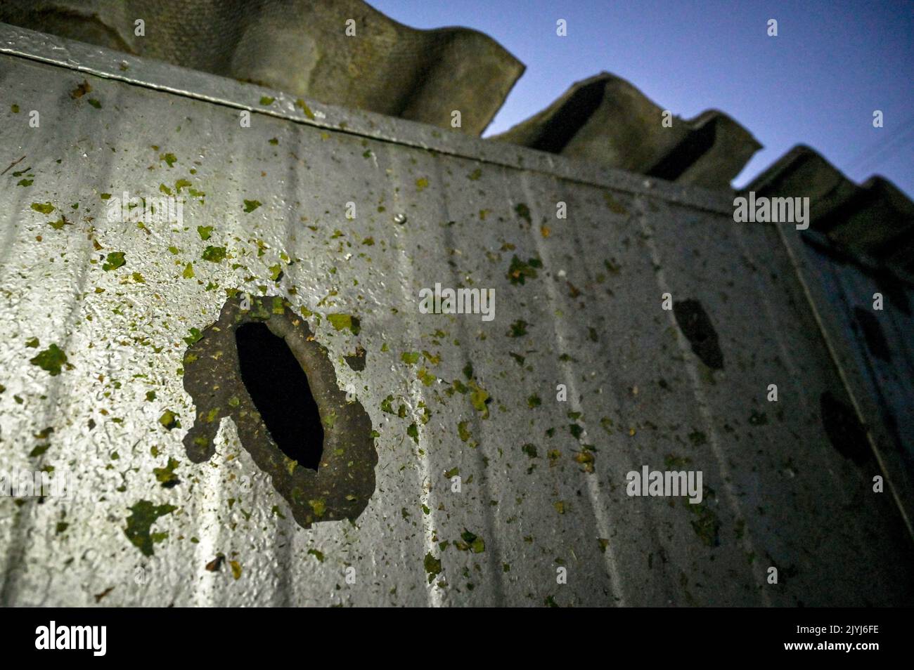 MALA TOKMACHKA, UKRAINE - SEPTEMBER 7, 2022 - Shrapnel holes dot a ...