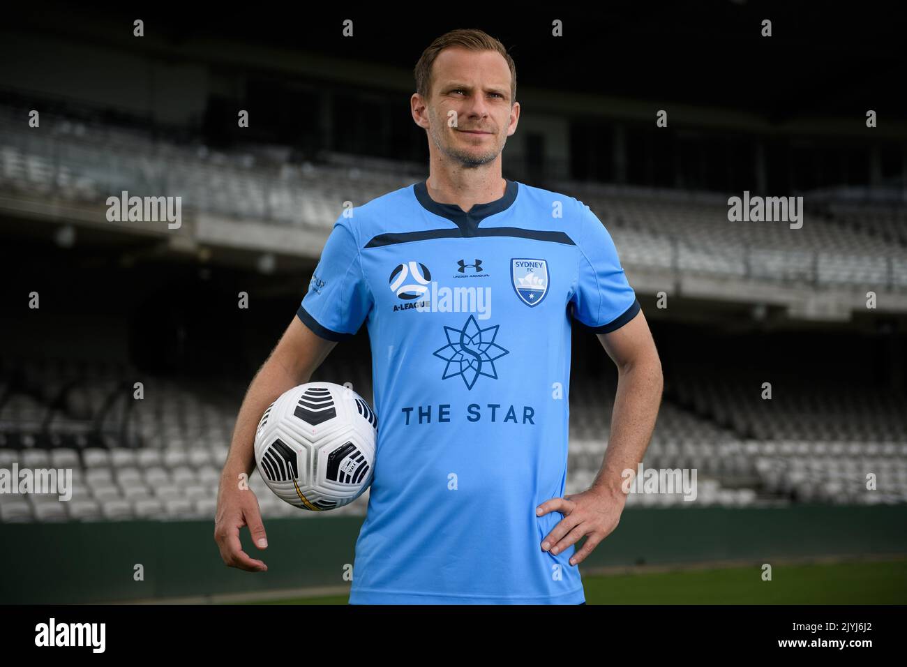 Alex Wilkinson of Sydney FC poses for a photograph during a team media ...
