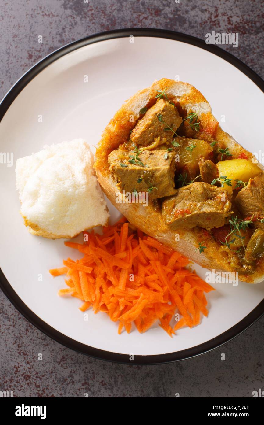 Durban Bunny Chow or a quarter mutton bunny consisting of a section of ...