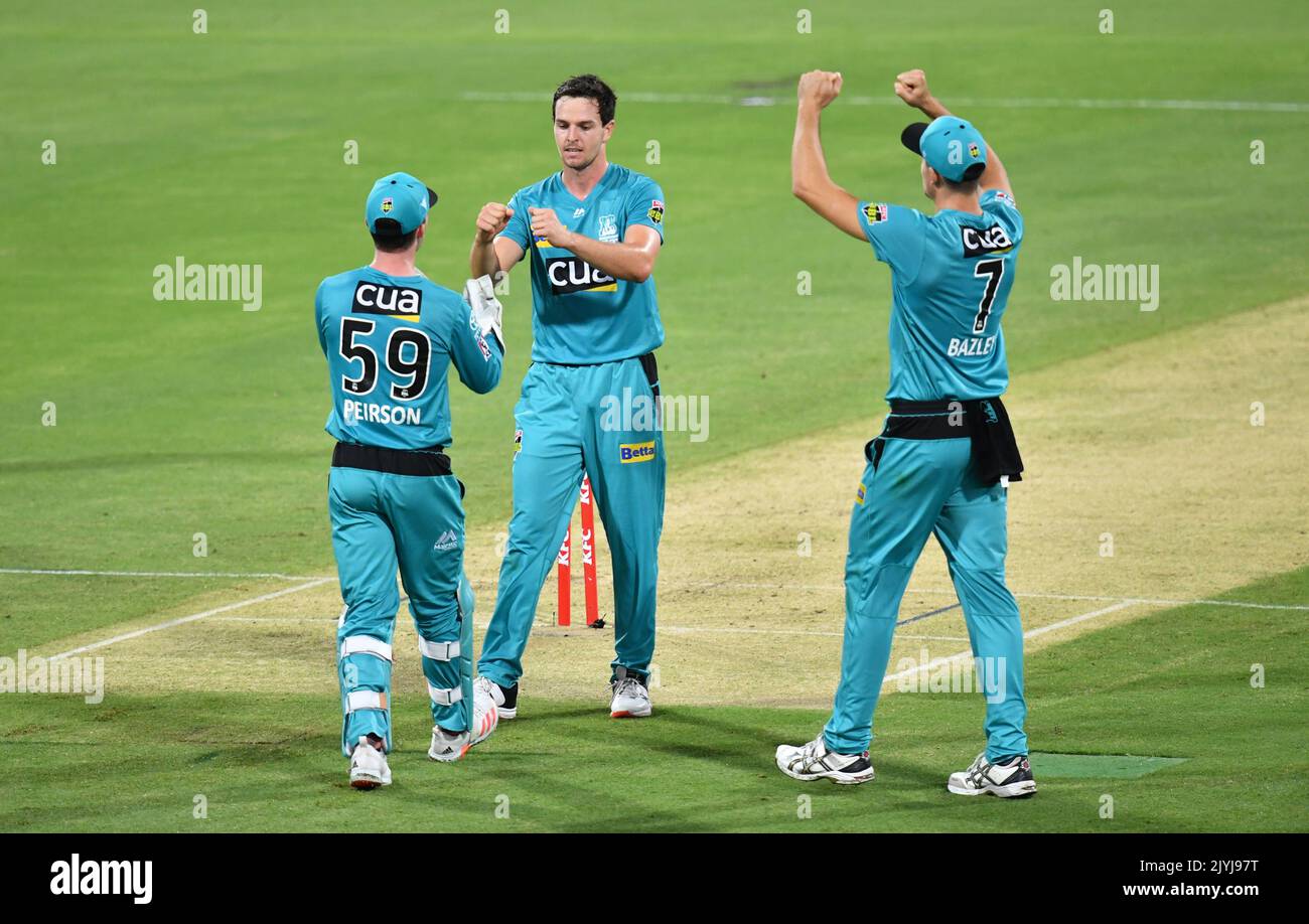 Jack Wildermuth (centre) of the Heat celebrates with team mates after ...