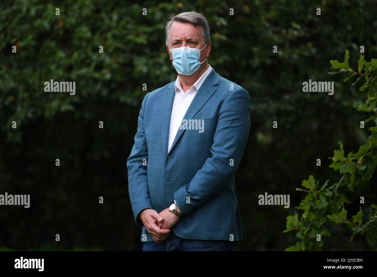 Victorian Health Minister Martin Foley looks on during a press ...