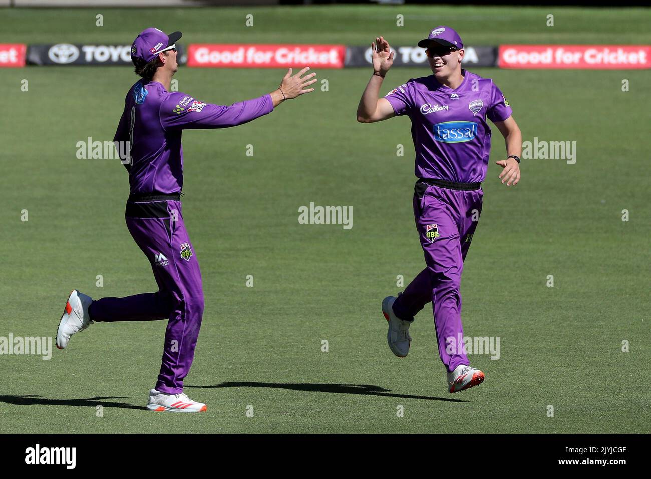 Nathan Ellis (right) of the Hurricanes is congratulated by teammates ...