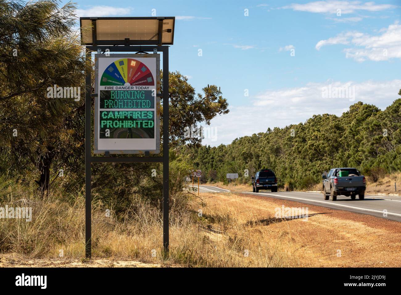 A roadside fire danger sign indicating severe conditions with camp ...