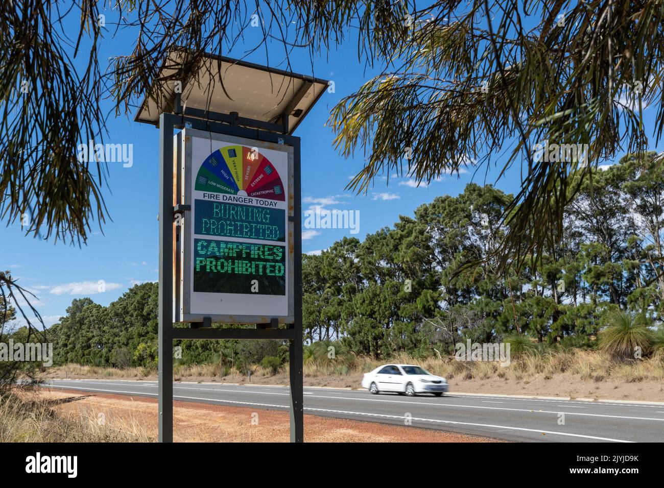 A roadside fire danger sign indicating severe conditions with camp ...