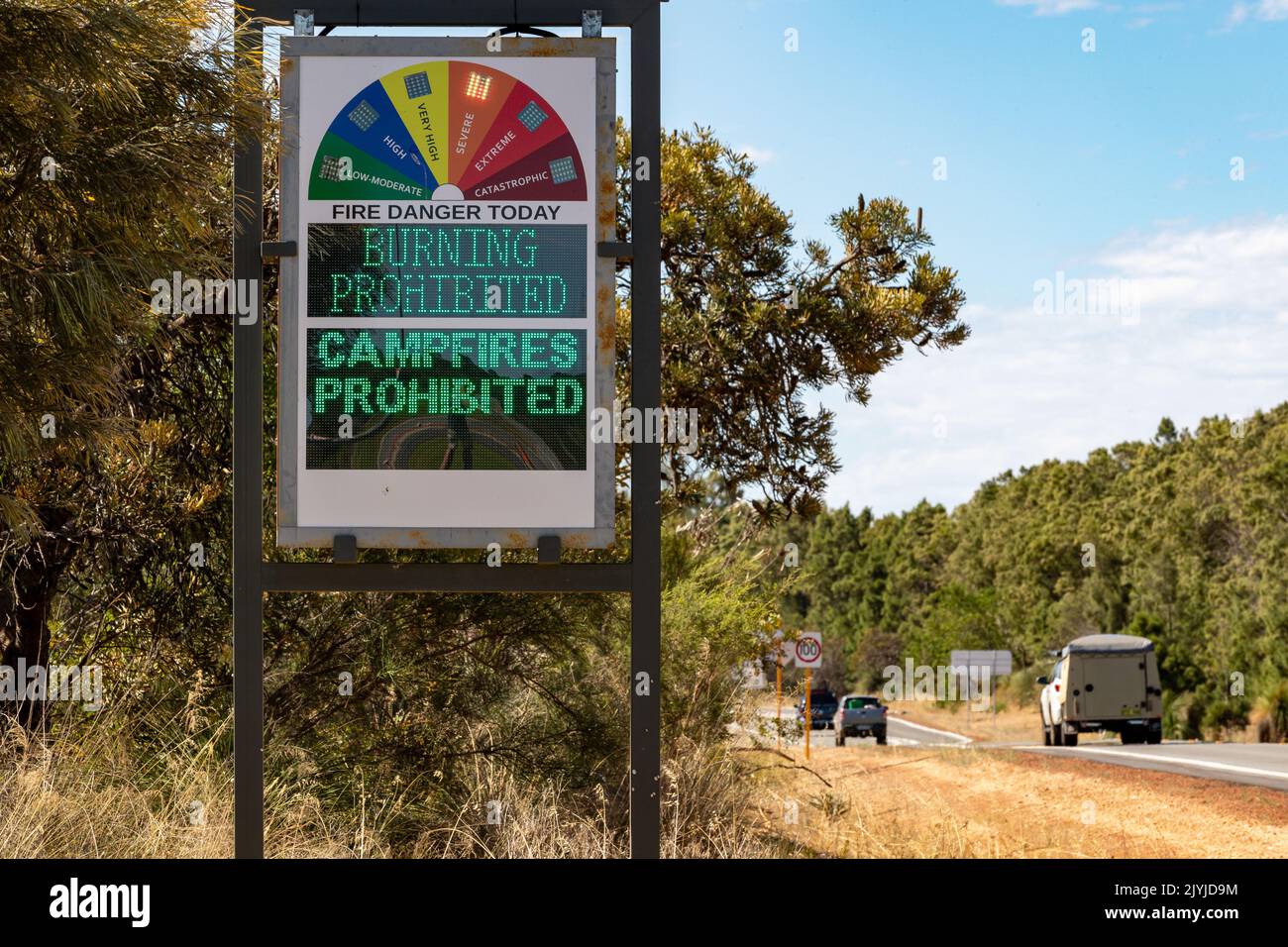 A roadside fire danger sign indicating severe conditions with camp ...
