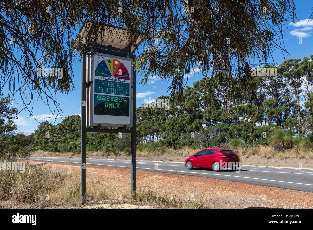 A roadside fire danger sign indicating severe conditions with camp ...