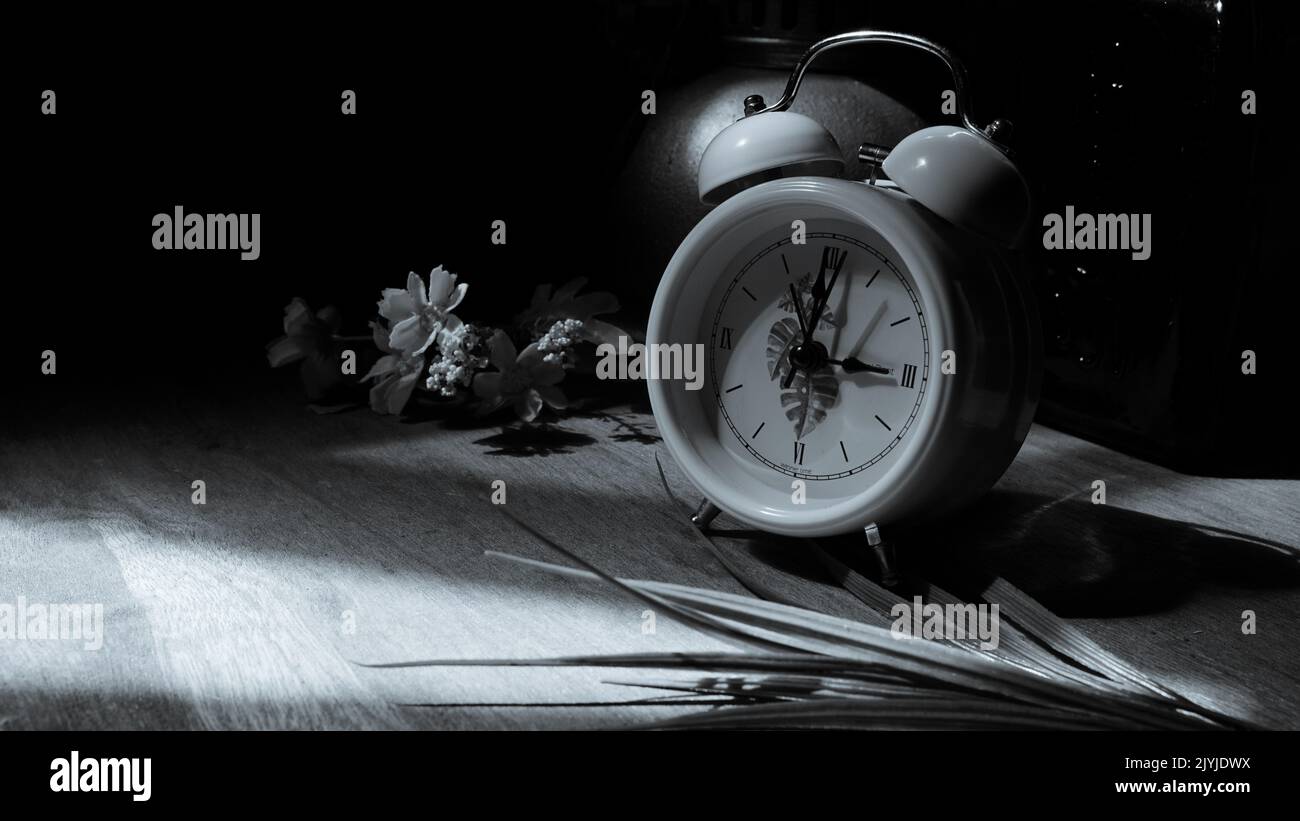 black and white photo of an alaram clock Stock Photo - Alamy