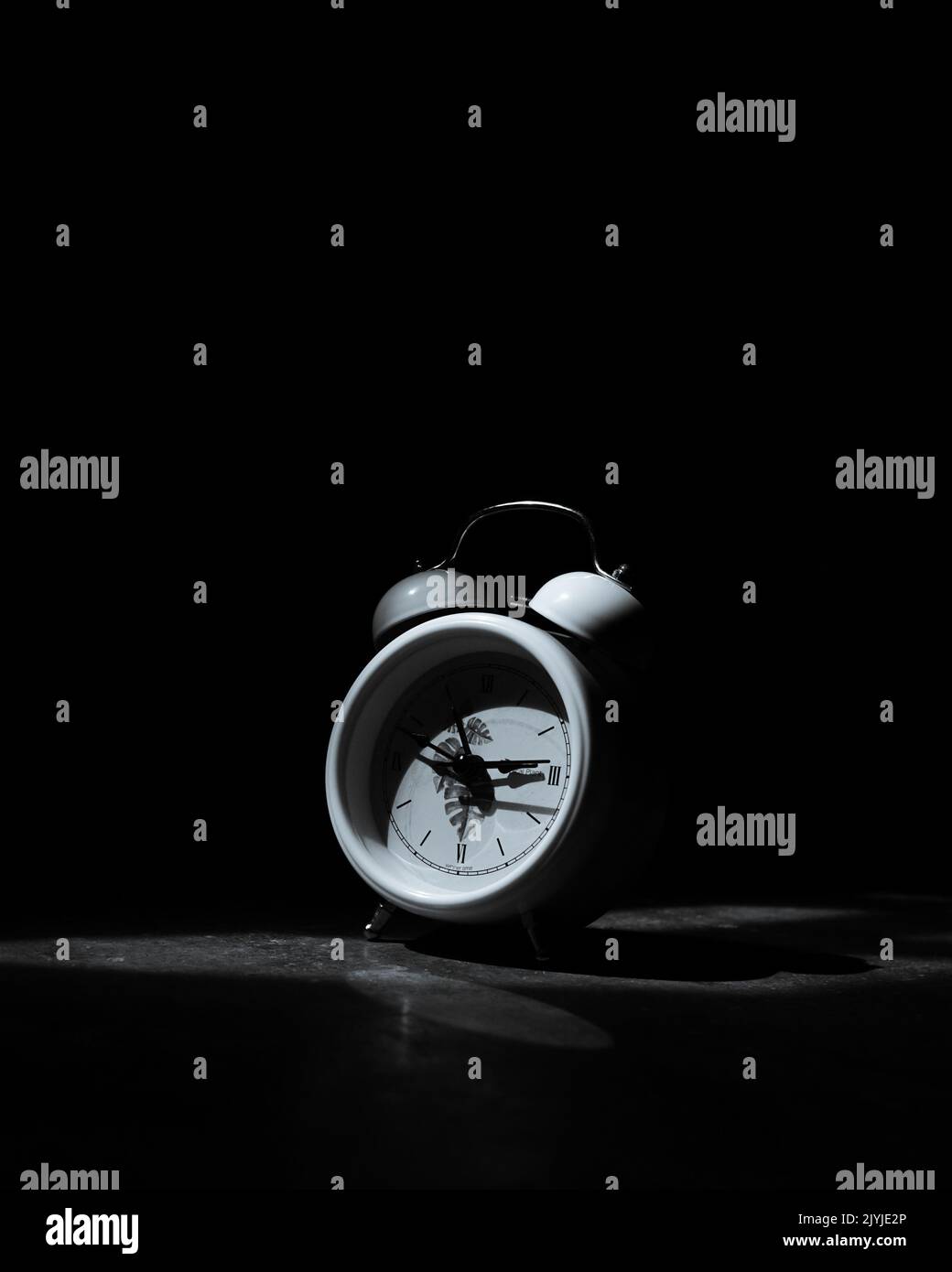 black and white photo of an alaram clock Stock Photo - Alamy