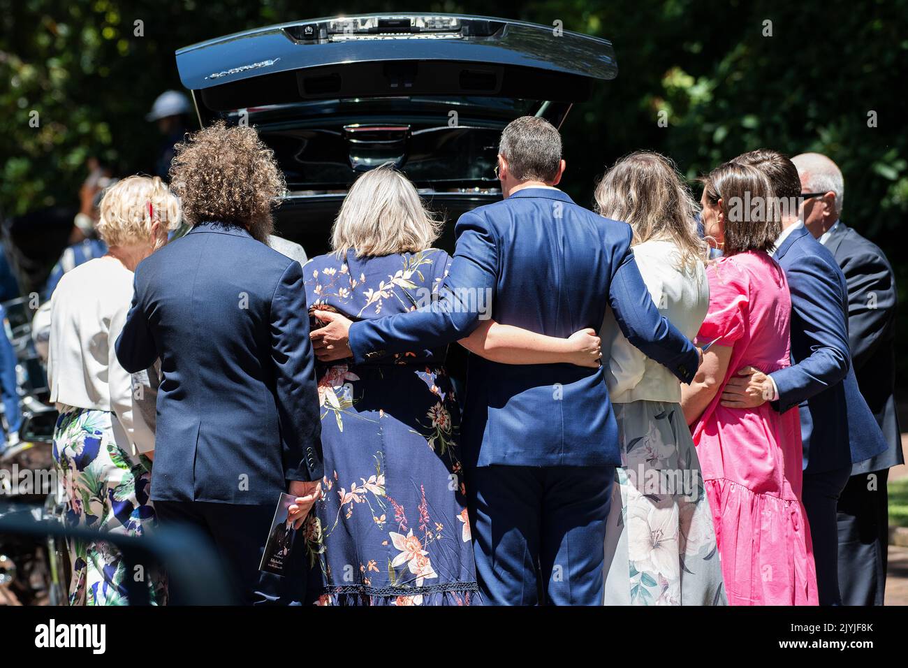 Family of Senior Constable Kelly Foster are seen in front of her casket ...