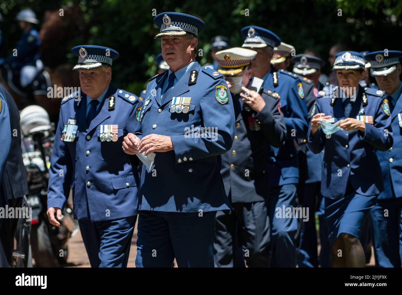 Members of the NSW Police Force are seen arriving for the police ...