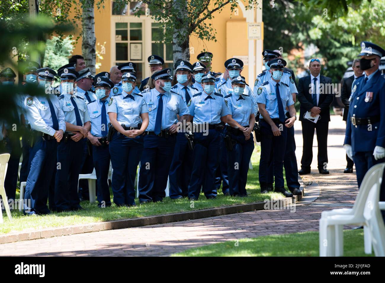 Members of the NSW Police are seen lining the exit of the church during ...