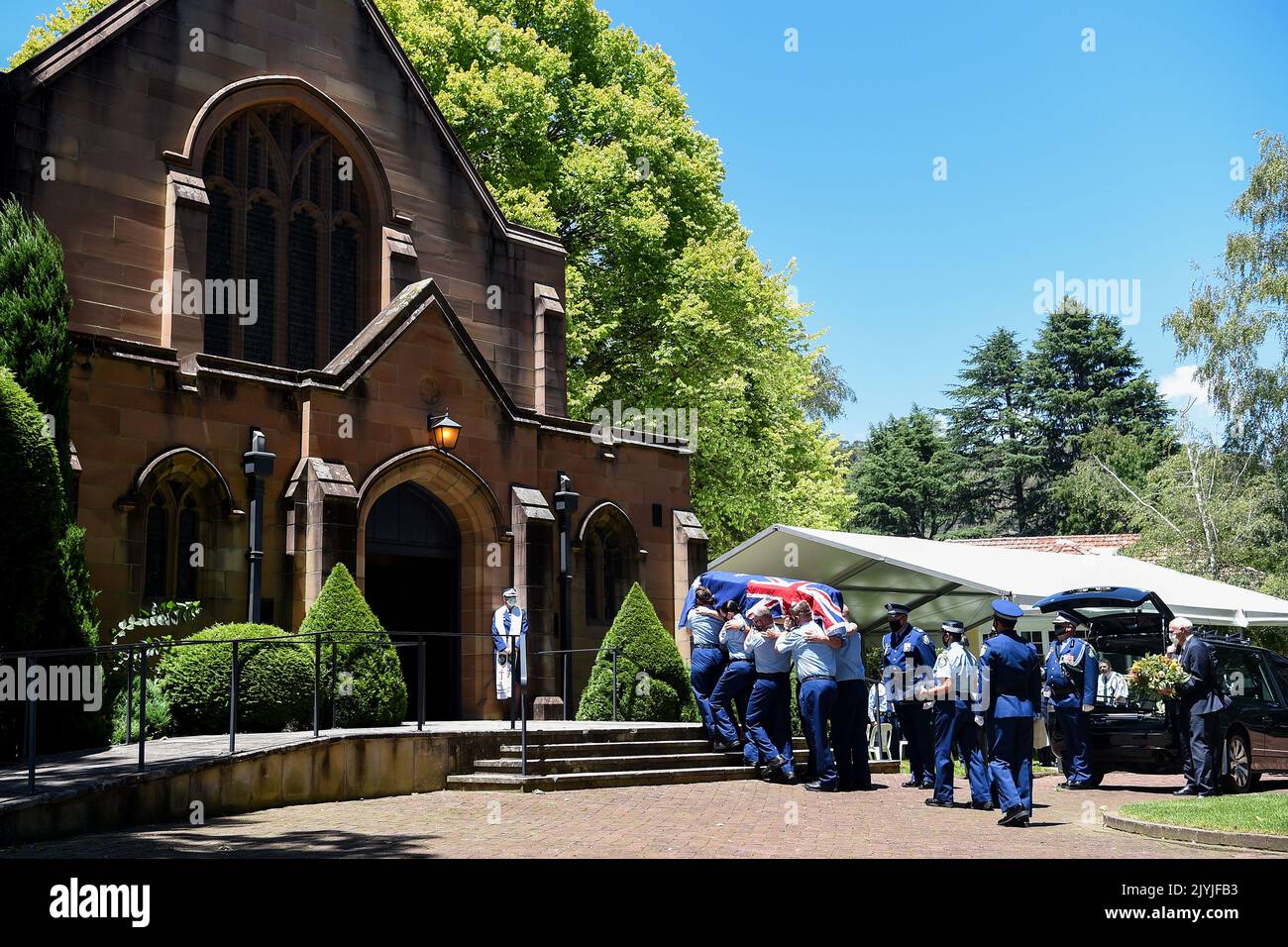 The casket of Senior Constable Kelly Foster is carried into the church ...