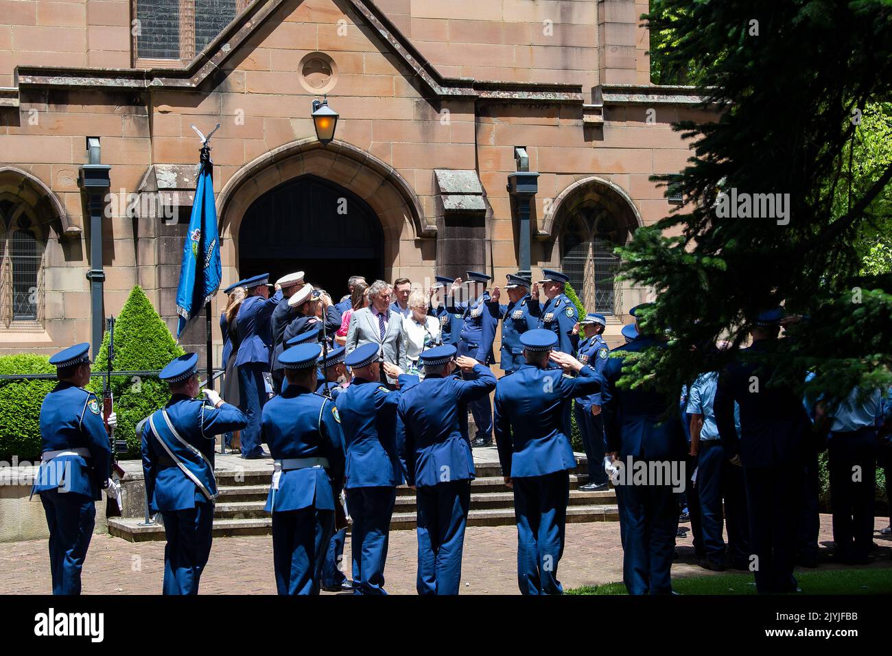 The parents of Senior Constable Kelly Foster are seen as her casket ...