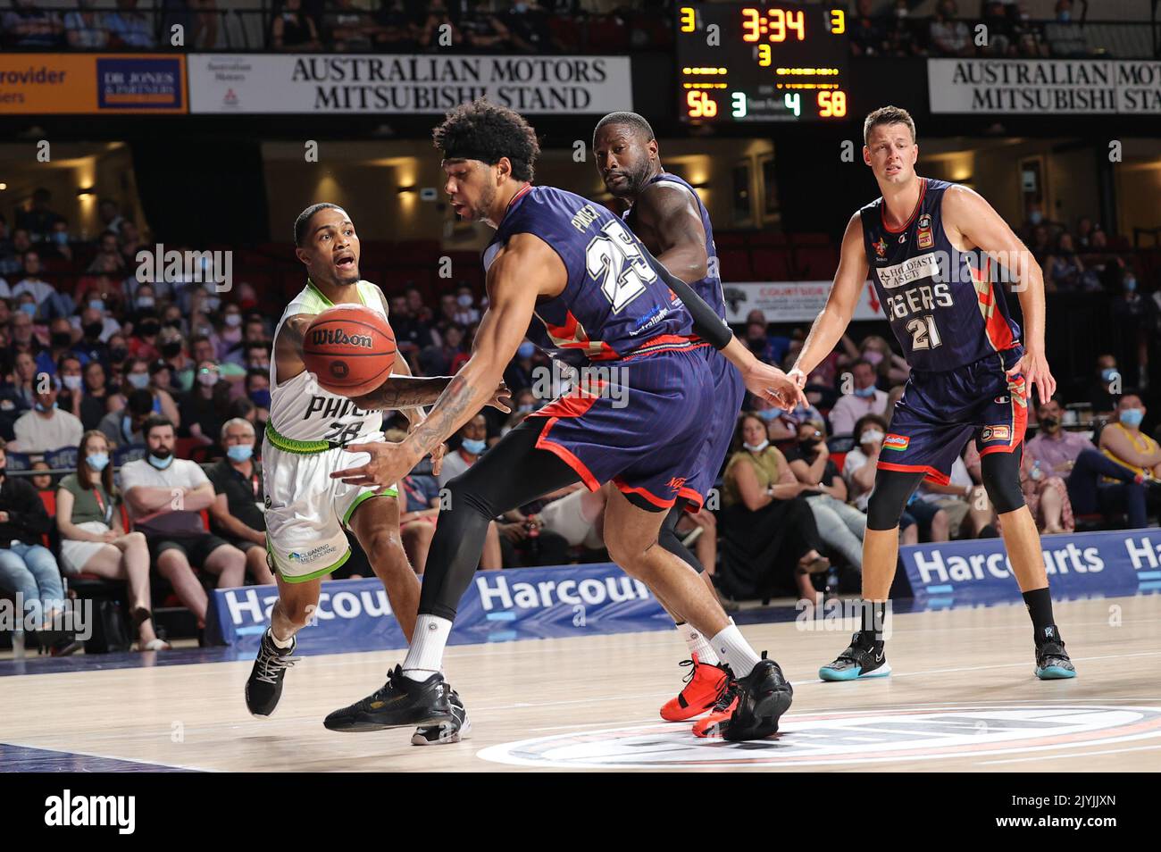 Keifer Sykes of the Phoenix and Keanu Pinder of the 36ers during the ...
