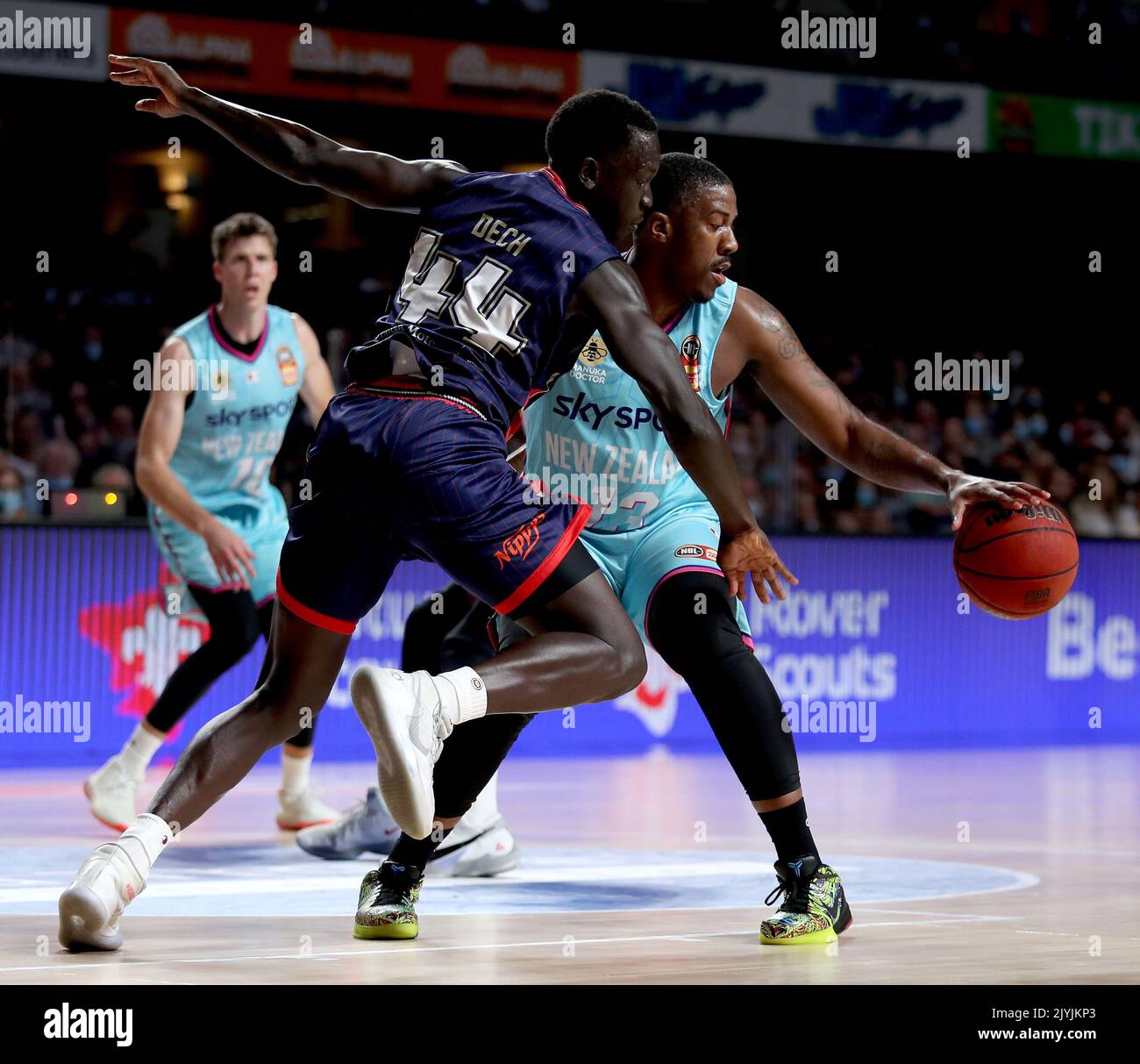 Sunday Dech of the Adelaide 36ers competes with Lamar Patterson of the ...