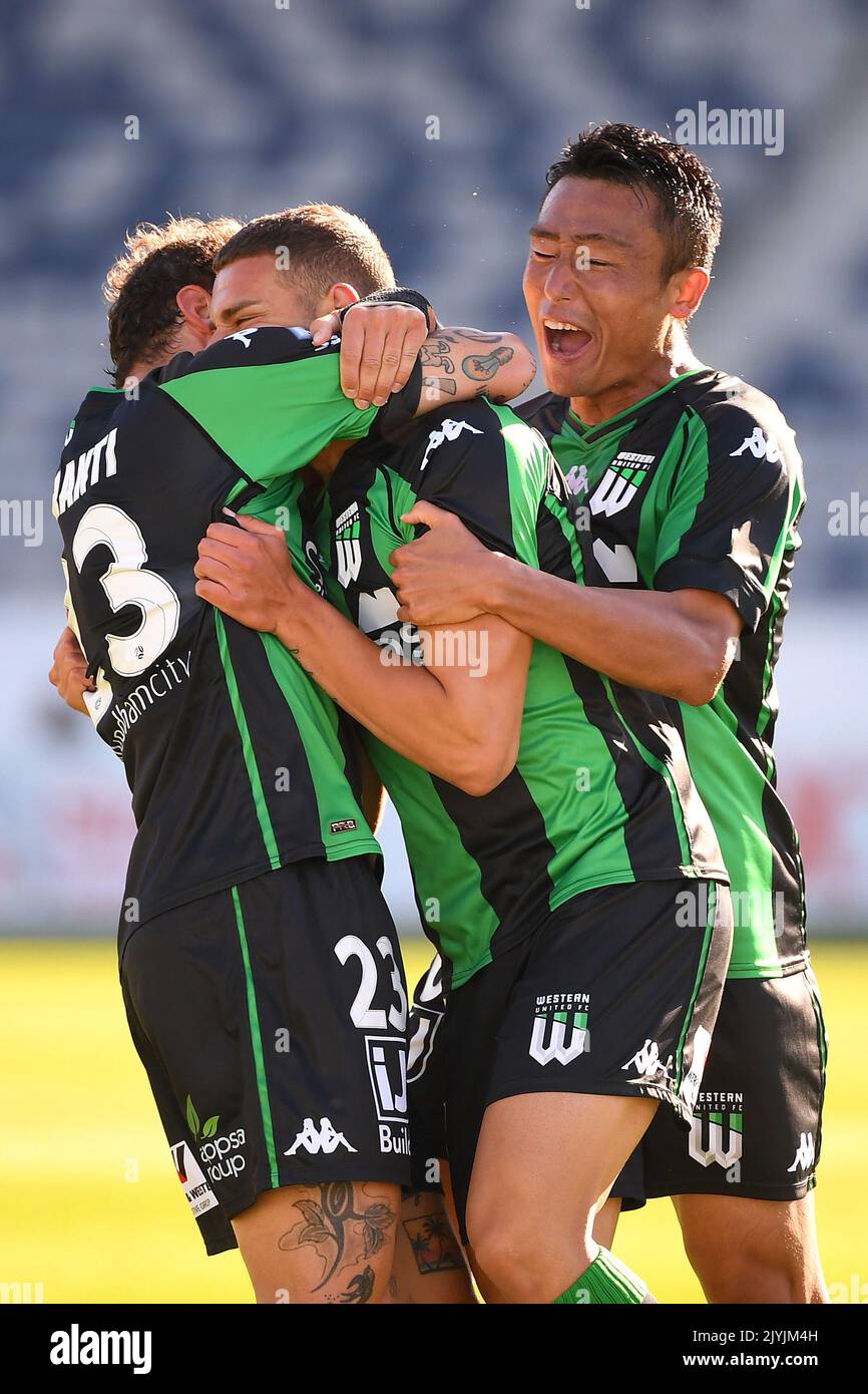 Tomoki Imai of Western United (right) celbrates with teammates after ...
