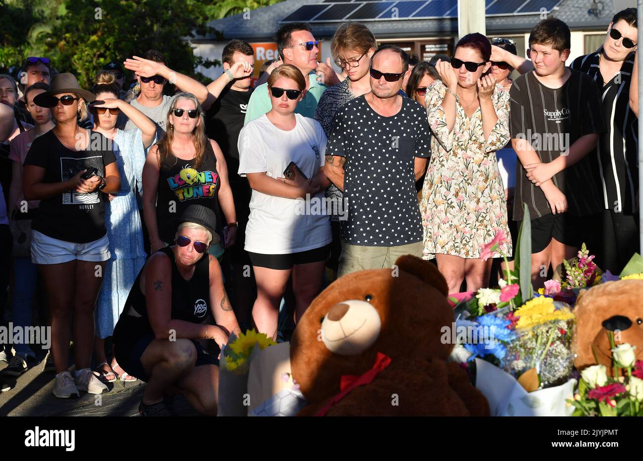 People are seen at a vigil for Kate Leadbetter, 31, and Matthew Field ...