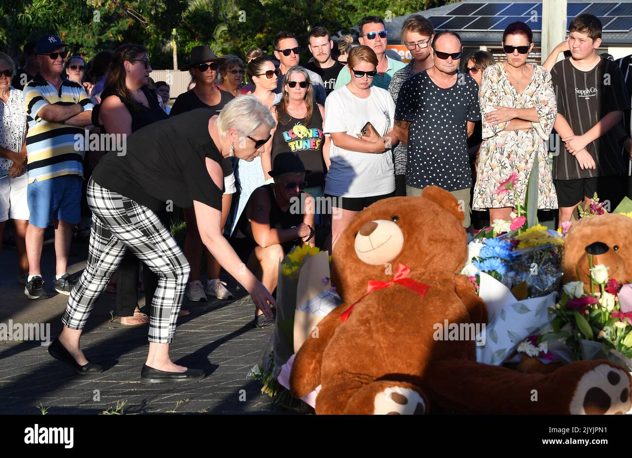 People are seen at a vigil for Kate Leadbetter, 31, and Matthew Field ...