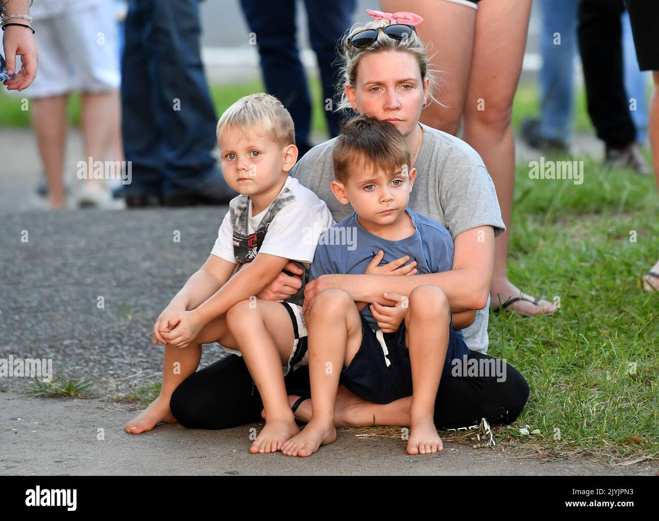 People are seen at a vigil for Kate Leadbetter, 31, and Matthew Field ...