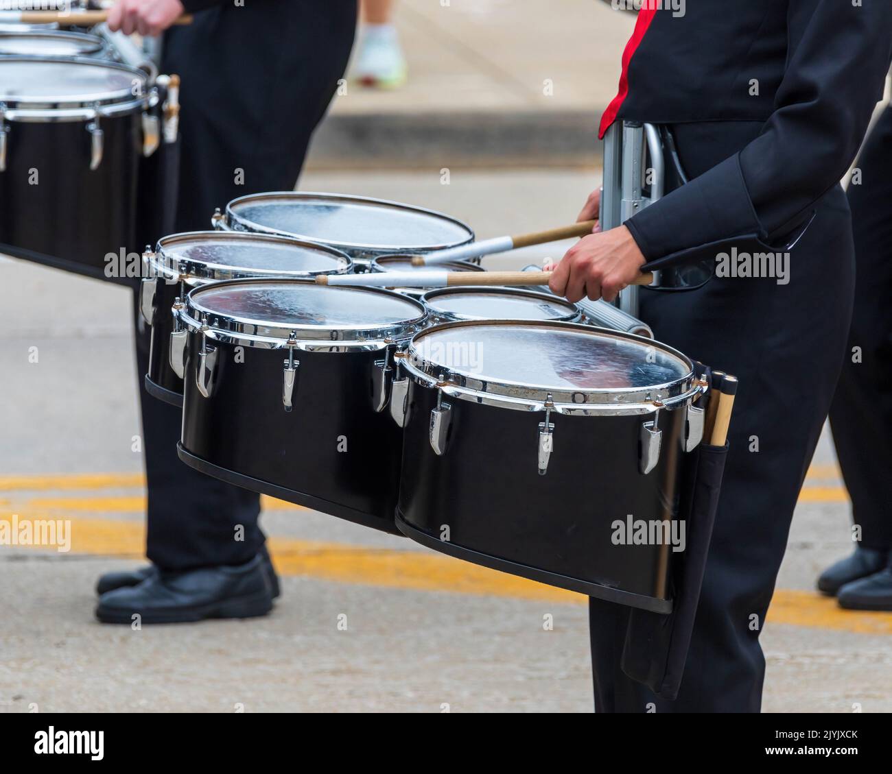 one snare drum of a marching band drum line warming up for a parade ...