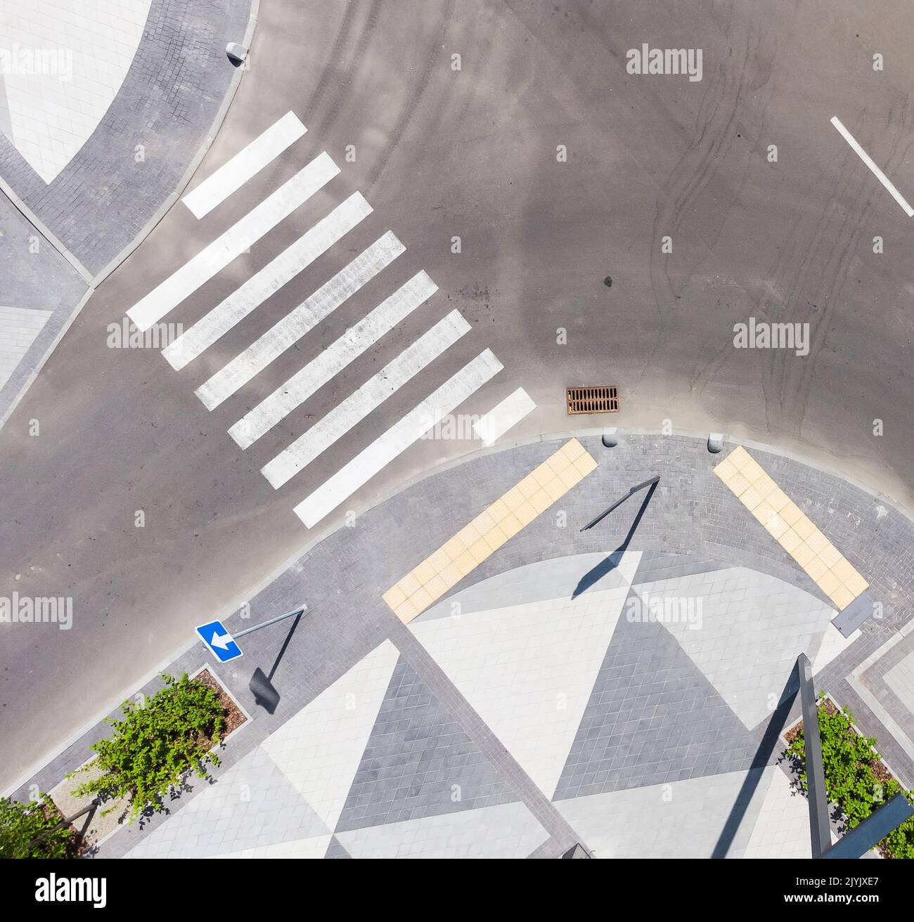 aerial top view of street with parking lot near new residential housing ...