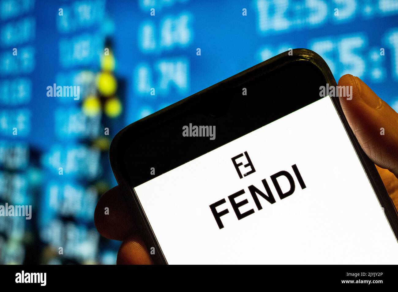 In this photo illustration, the Italian luxury fashion brand Fendi logo ...