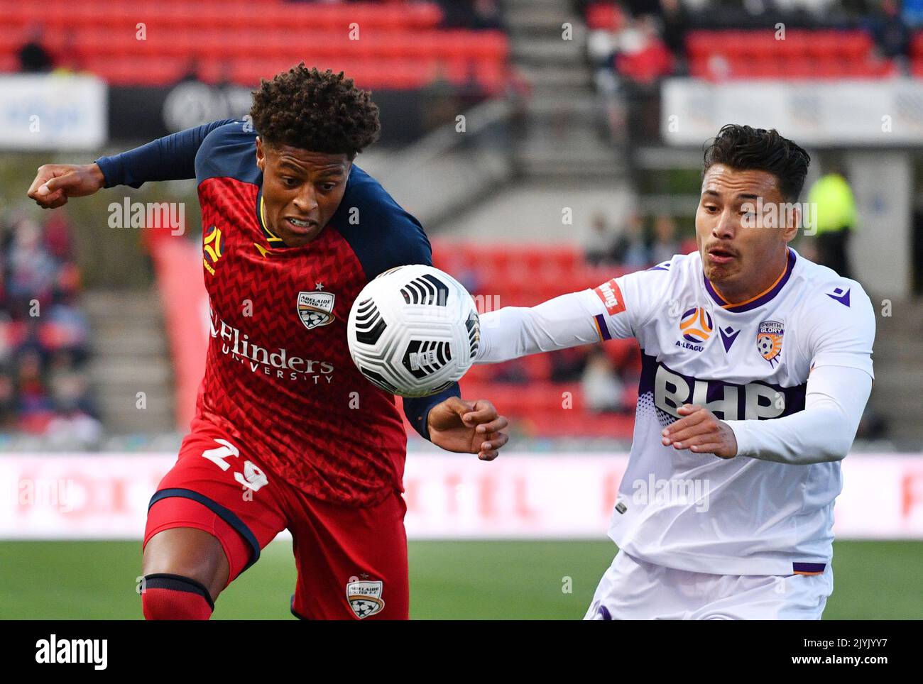Kusini Yengi of United and Dane Ingham of Perth Glory during the A ...