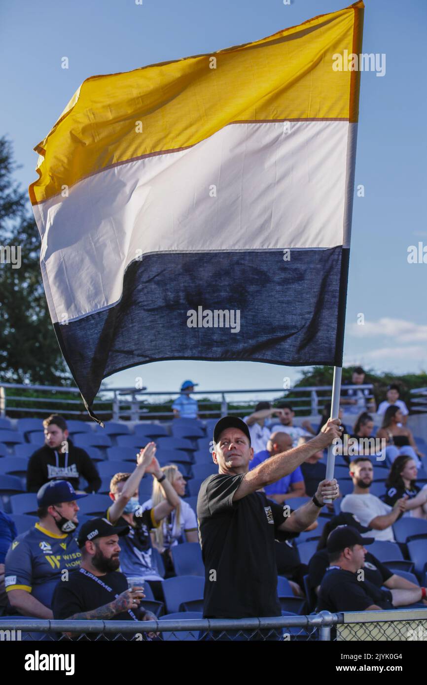 A fan with a Macarthur FC flag during the A-League match between ...