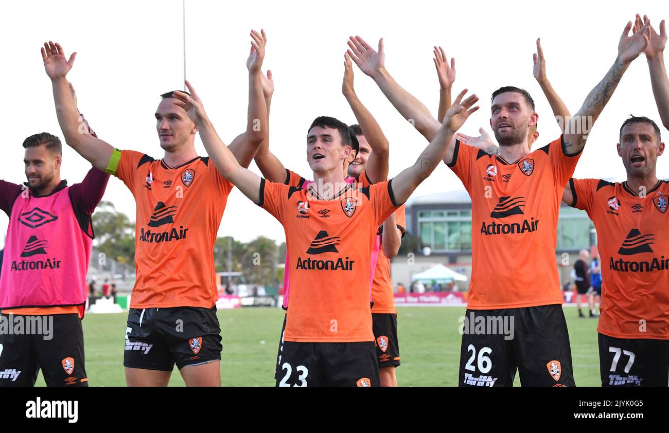 Dylan Wenzel-Halls (centre) of the Roar celebrates winning with team ...