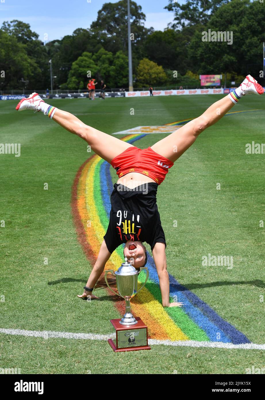 Jade Pregelj of the Suns is seen performing a cartwheel behind the ...
